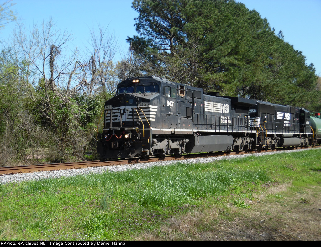 A faded "THB" Dash8 leads NS A01 west